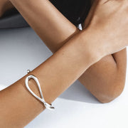 Mercy Twist Bangle in Silver – Gump's
